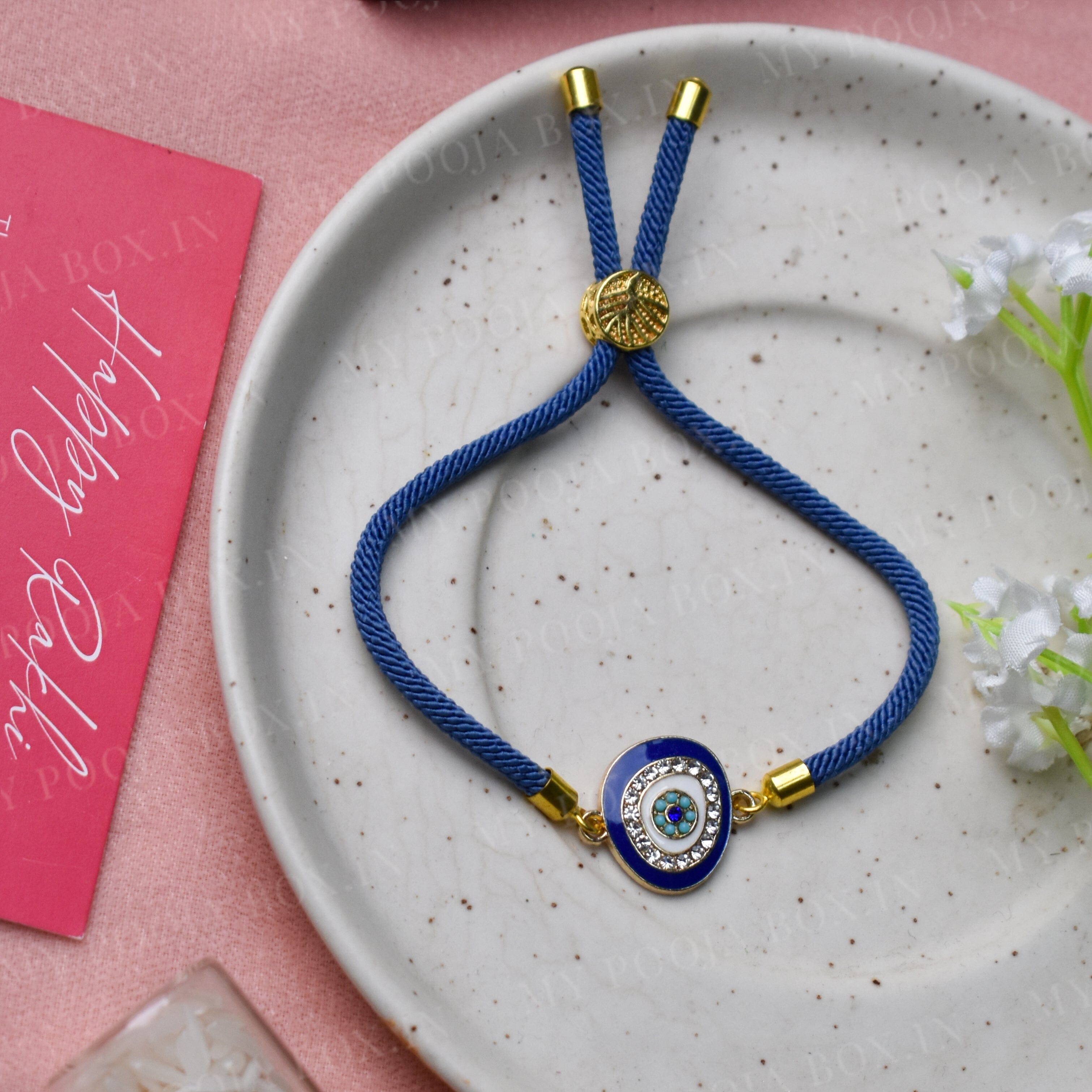 Buy Niloofar Evil Eye Protection Rakhi Band Online in India - Mypoojabox.in